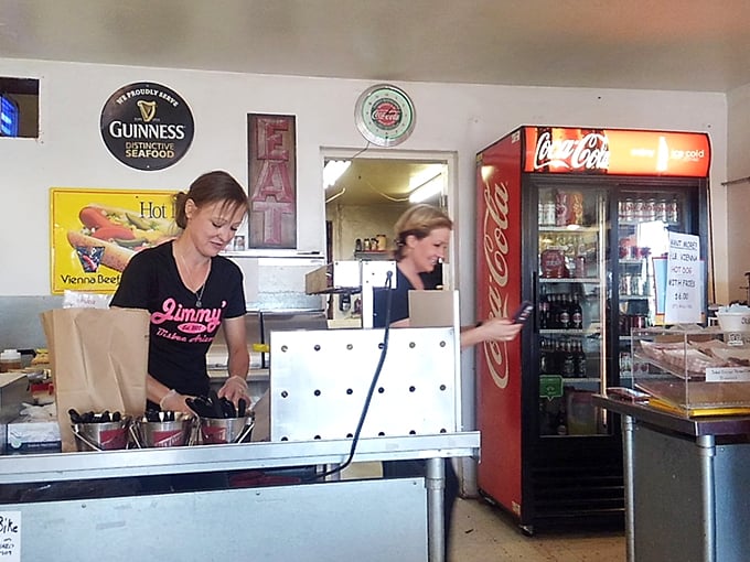 The unsung heroes of hot dog heaven! Jimmy's staff works their magic, turning simple ingredients into mouthwatering masterpieces.