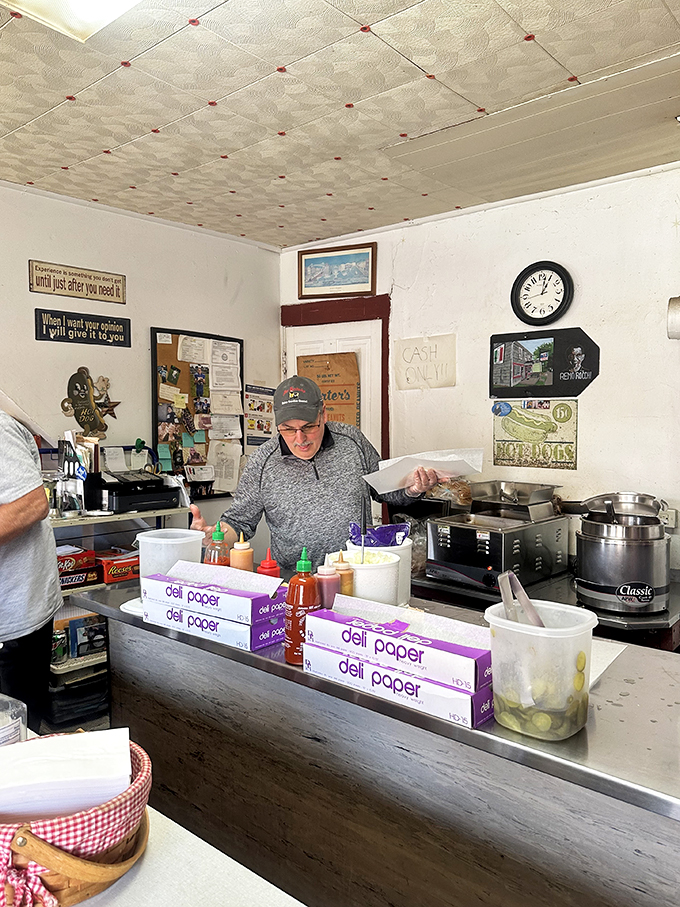 Masters of their craft! These hot dog heroes work their magic, turning simple ingredients into edible art.