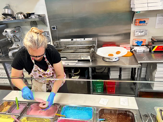 Donut artists at work! These culinary magicians turn simple dough into rings of pure bliss.