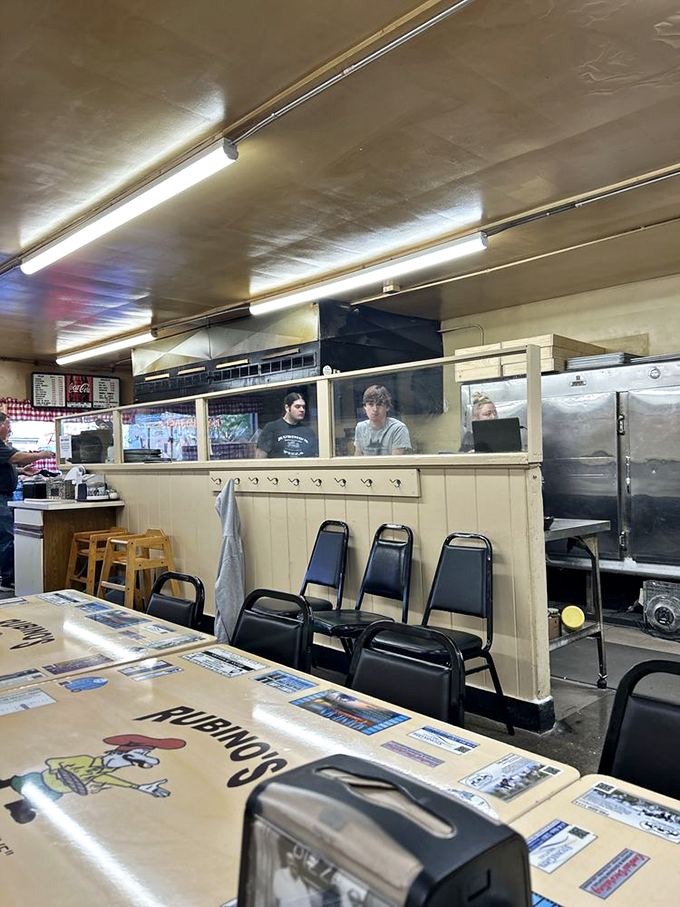 Behind the scenes magic! Rubino's staff are the unsung heroes, turning dough and sauce into edible art.