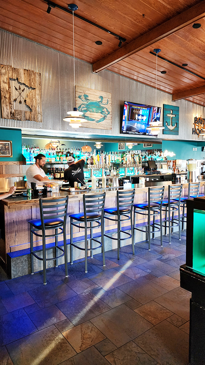 Where the magic happens. These bartenders are mixing up coastal vibes faster than you can say "shaken, not stirred."