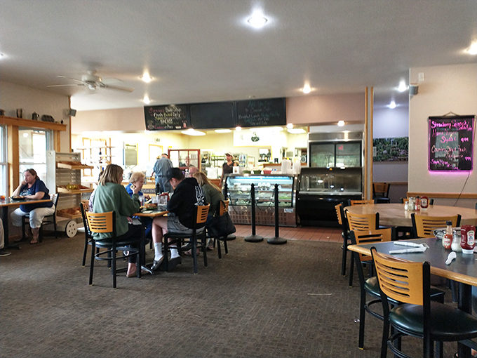 The bustling heart of Connie's, where culinary magic happens. These folks could probably flip pancakes in their sleep (but let's hope they don't).