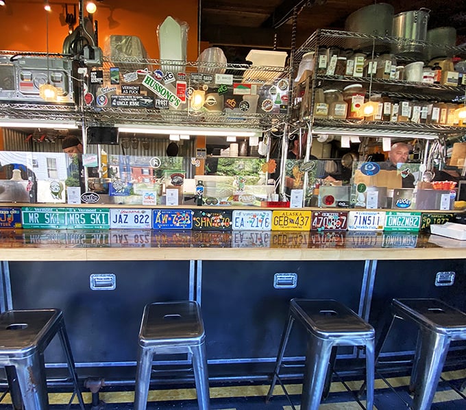 License plate art meets tequila heaven. This bar top is a road trip for your taste buds, with each sip taking you further into flavor country.