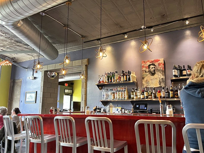 Atomic cocktails, anyone? This sleek bar setup looks ready to shake up your evening with some mid-century modern flair.