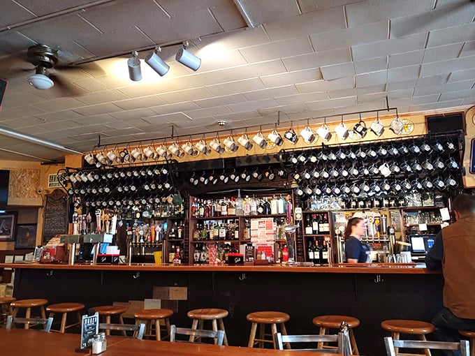 Mug shot central! Rollie's impressive collection of hanging mugs is like a "Who's Who" of loyal patrons. Your mug could be next!