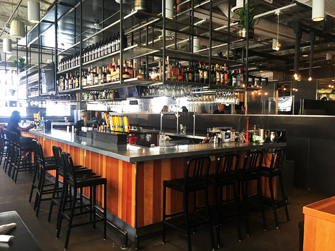 Bar's open, folks! With more bottles than a recycling center, this bar is ready to quench any thirst that comes its way.