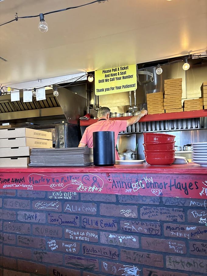 Where the magic happens! This bustling counter is like mission control for pizza perfection, orchestrating a symphony of flavors with every order.