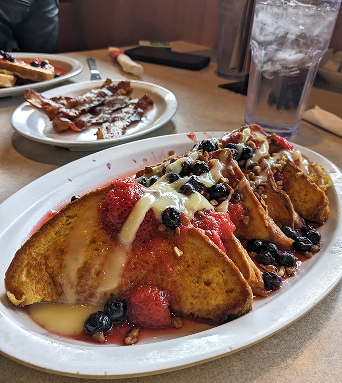 Berry-licious French toast that's almost too pretty to eat. Almost. Who needs a fancy brunch when you've got this?