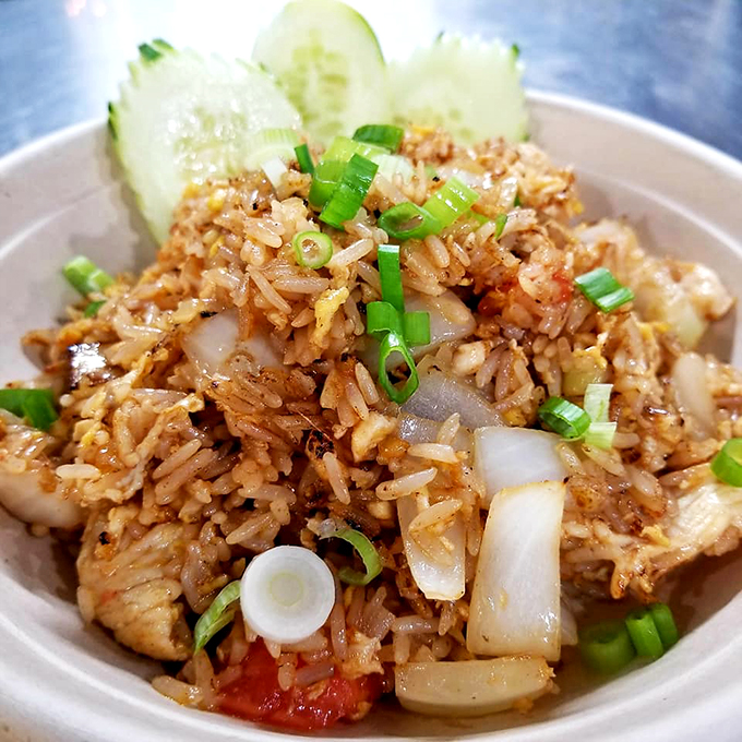 This isn't your average fried rice - it's a flavor fiesta in a bowl! Each grain looks ready to dance the cha-cha on your taste buds. 