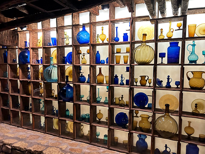 A kaleidoscope of color and light! This mesmerizing display of glassware is what happens when a mad scientist decides to open an antique shop.