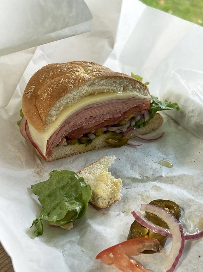 Now that's what I call a sandwich! This Italian masterpiece is stacked higher than my college debt, but infinitely more satisfying.