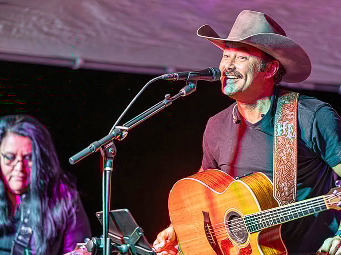 Cowboy crooner or mountain minstrel? Either way, this performer's got Alpine toe-tapping to a high-altitude beat.