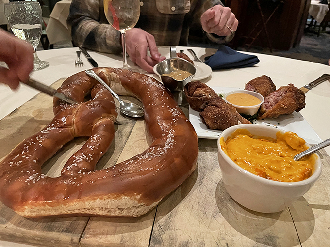 Holy dough, Batman! This pretzel isn't just a snack, it's an edible work of art. Paired with beer cheese, it's kryptonite for your diet.