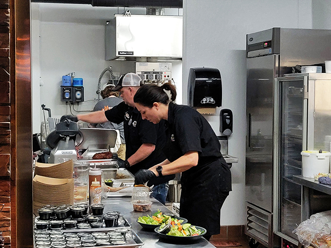 Behind the scenes magic. The kitchen crew works their smoky sorcery, turning raw ingredients into mouthwatering masterpieces. It's where the real action happens!