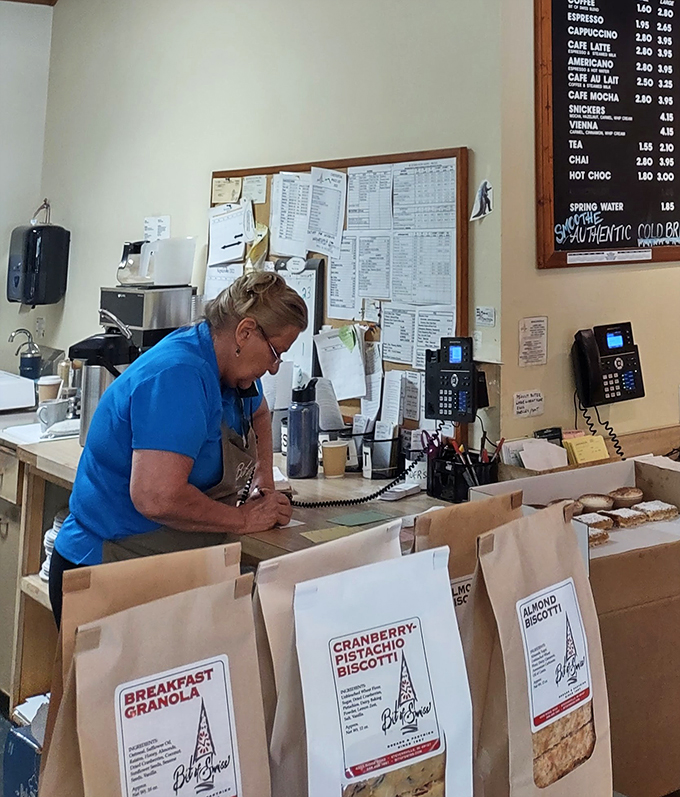 Behind the scenes at Bit of Swiss. This dedicated staff member is the wizard behind the curtain, making pastry magic happen.