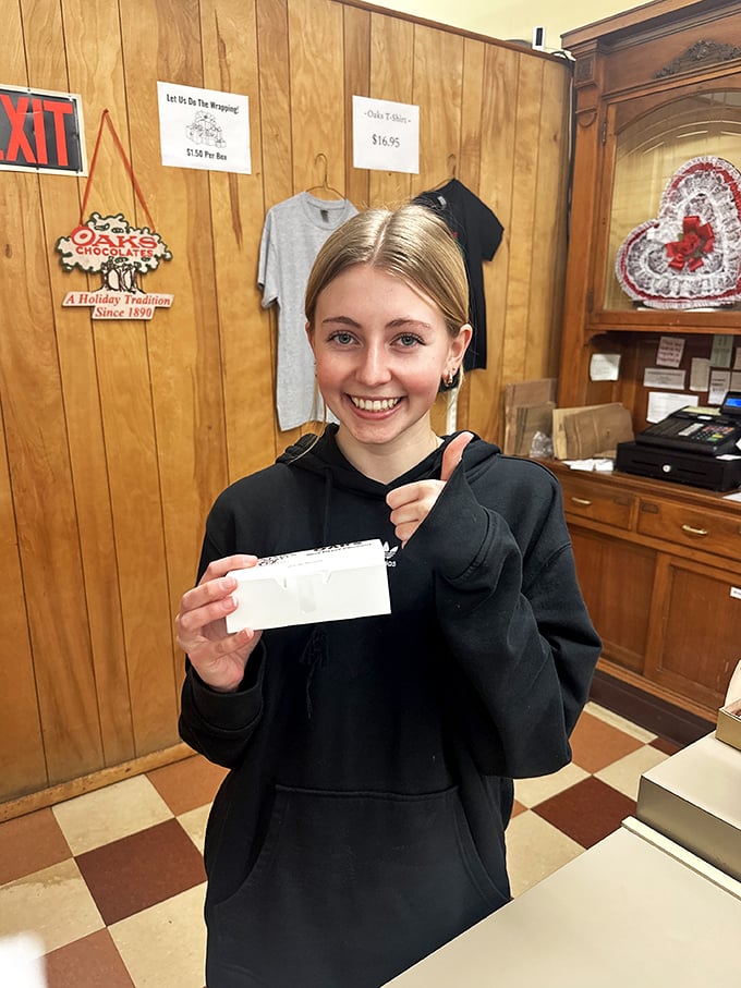The staff at Oaks Candy Corner: Spreading joy one sweet treat at a time. They're like Santa's elves, but with better dental plans.