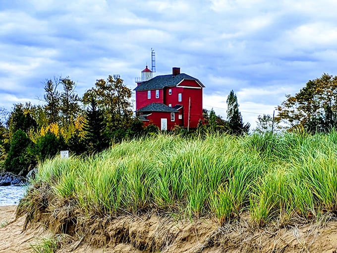 Little Red Riding Hood's summer home? This crimson cutie stands out against Lake Superior's rocky shore like a beacon of sass.