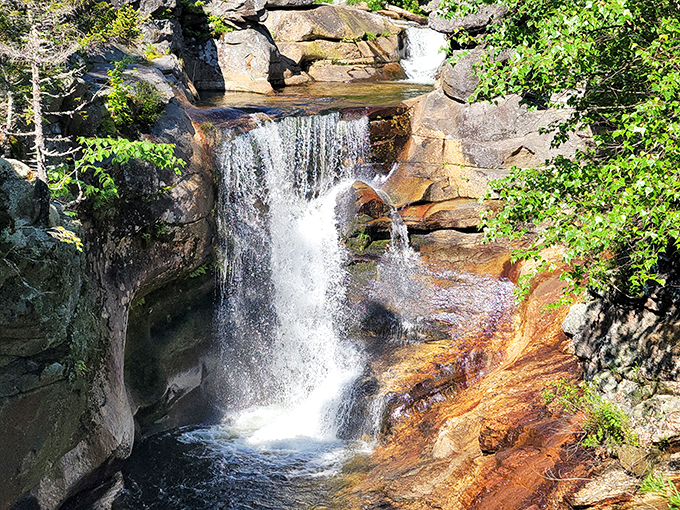 Nature's own sculpture garden. Screw Auger Falls proves that water is the ultimate artist, carving masterpieces into solid rock.