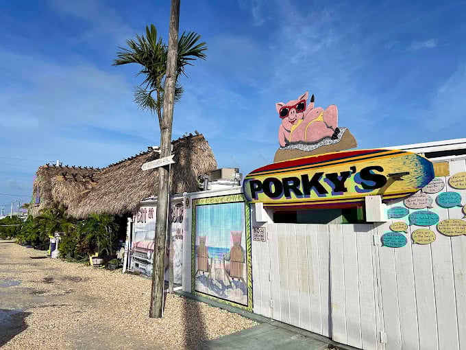 Porky's sign: Oink if you love key lime pie! Porky's Bayside is serving up slices of Florida fun with a side of ocean views.