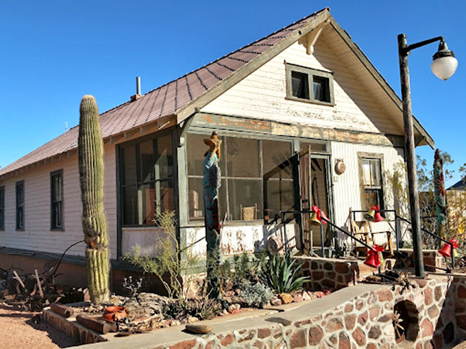 Home sweet home, miner style! This quaint cabin whispers tales of frontier life, complete with a cactus doorman.