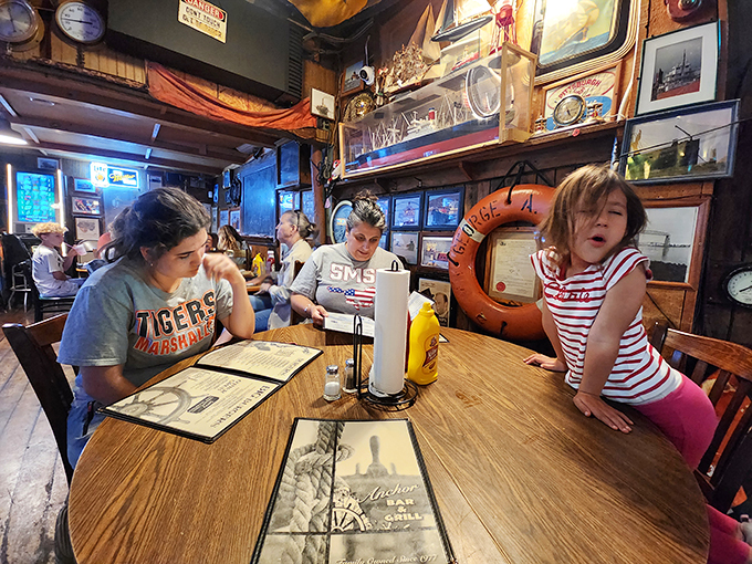 Happy diners, nautical decor, and the promise of great food. It's like being on the set of Cheers, but with better burgers.
