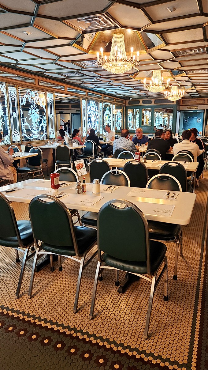 Where chandeliers meet comfort food. Versailles' dining room is like your abuela's house got a glamorous makeover.