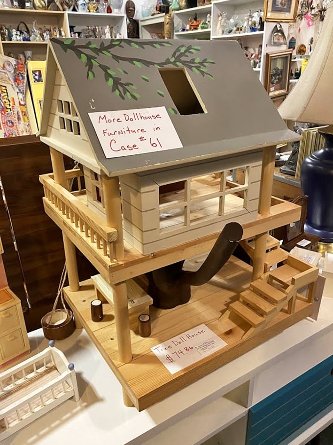 Honey, I shrunk the house! This adorable dollhouse is a miniature masterpiece, perfect for tiny interior decorators or aspiring architects.
