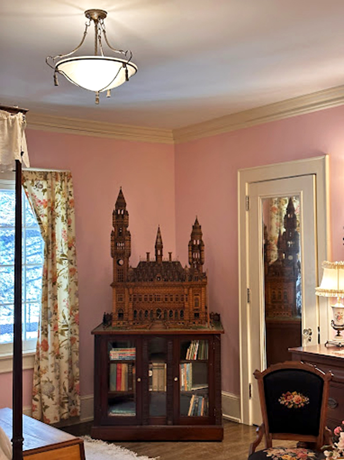 Pink walls and miniature castles? This room is what happens when Barbie meets History Channel.