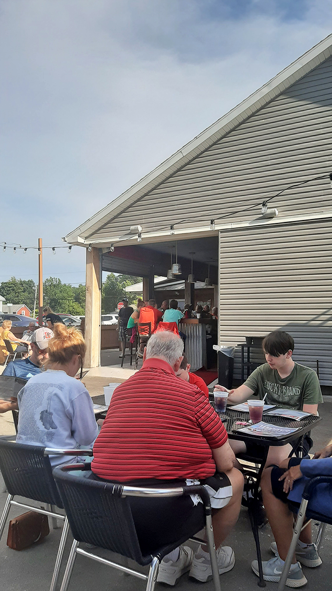 Al fresco feast! Woody's outdoor seating area is where sunshine meets sustenance, offering a side of fresh air with your favorite dishes.