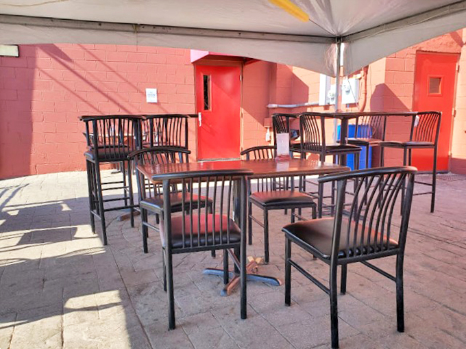 Outdoor seating that's hotter than a firefighter's calendar. Perfect for people-watching or cooling down after a spicy meal.