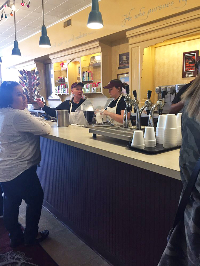 Behind the counter, ice cream alchemists work their magic. They're not just scooping, they're crafting happiness!