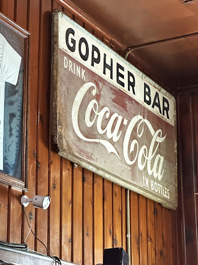 If these walls could talk, they'd probably order a Coke. This vintage sign is a fizzy reminder of simpler times.