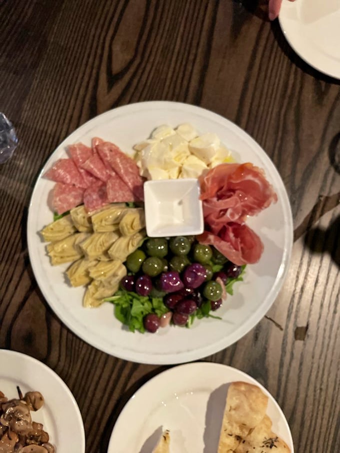 Antipasto perfection! This plate is a United Nations of flavors, where cured meats, cheeses, and olives coexist in delicious harmony. World peace never tasted so good!
