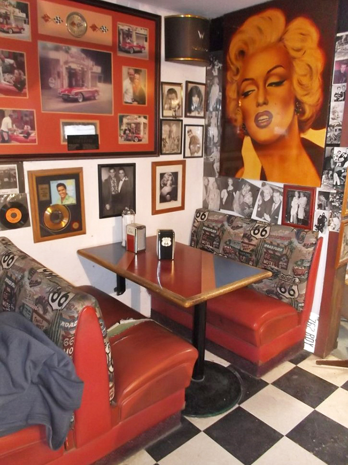 Marilyn Monroe watches over diners in this retro booth setup. It's like eating in a 1950s jukebox &ndash; just don't expect the King to take your order!