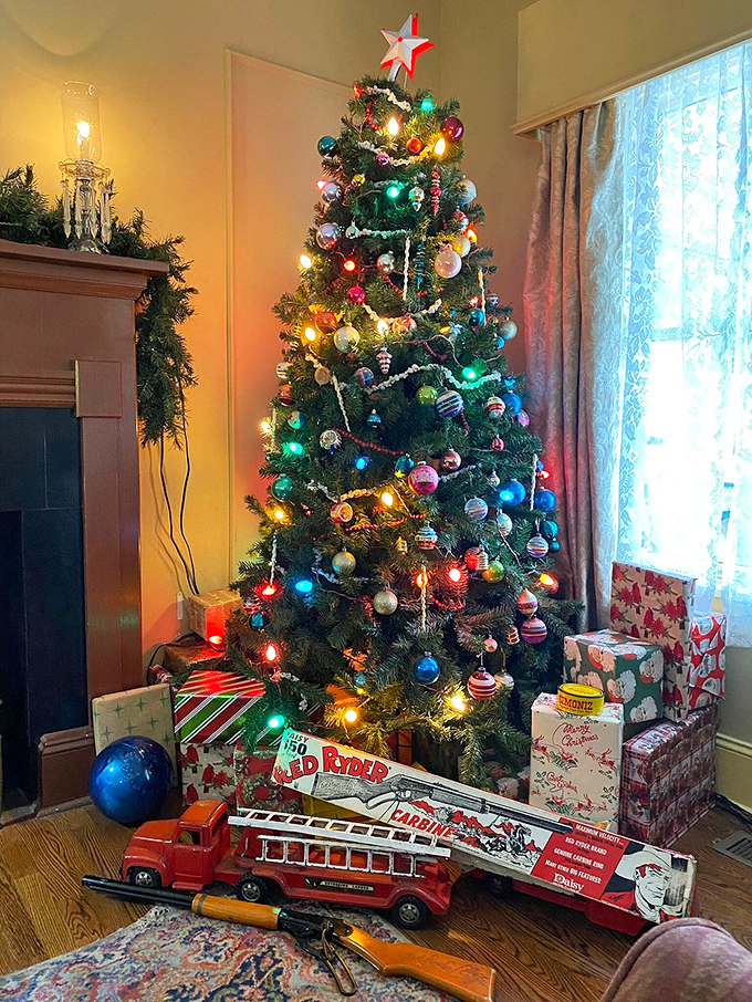 It's like Santa's workshop exploded in the living room! Ralphie's Red Ryder dreams come to life under this tree.