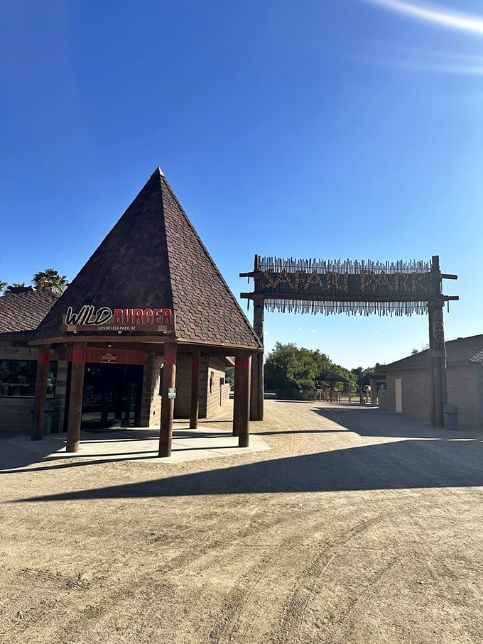 Pyramid scheme or snack central? This "Wild Burger" spot promises a taste of adventure between two buns.
