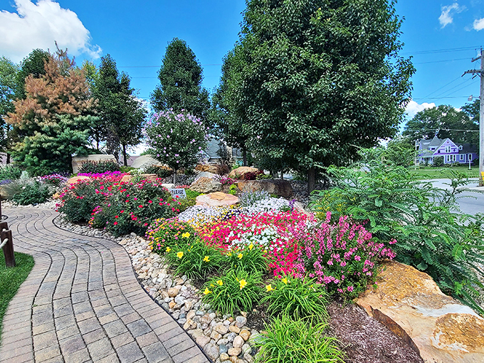A garden fit for giants, or at least their wind chimes. It's as if Mother Nature decided to throw a welcome party for her metallic friend.