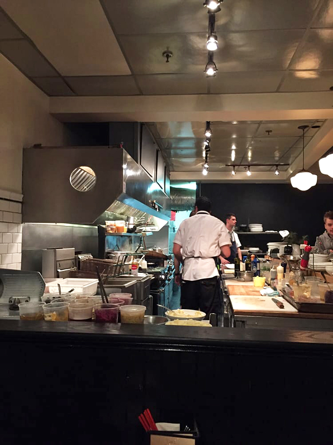 Peek into the heart of flavor central. This open kitchen is like a live cooking show, but with better aromas and zero commercial breaks.