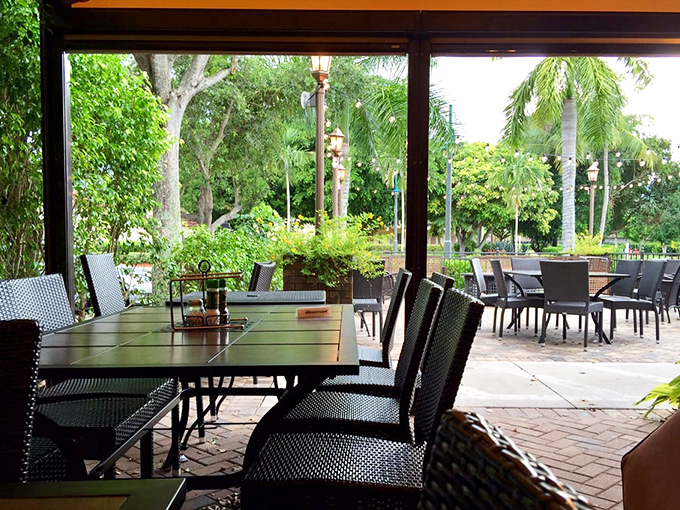 Outdoor seating that's a breath of fresh air. It's like dining in a lush Italian garden, but with the added bonus of Florida sunshine.