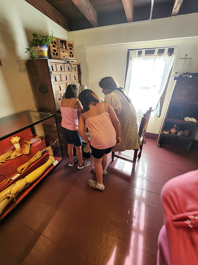 "And on your left, you'll see where they kept the leeches." Young visitors get a dose of history that's sure to cure any case of boredom.