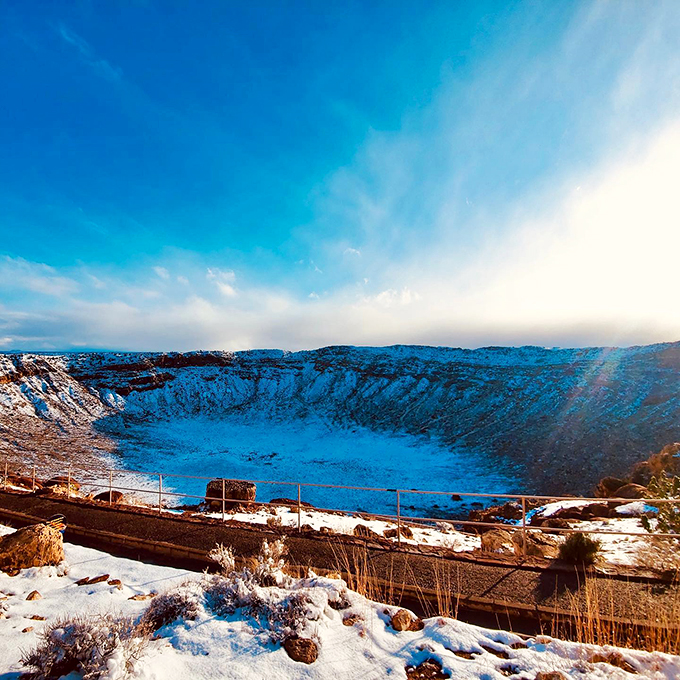 Winter wonderland meets lunar landscape! Snow-dusted Meteor Crater proves that even cosmic scars can look magical in the right light.