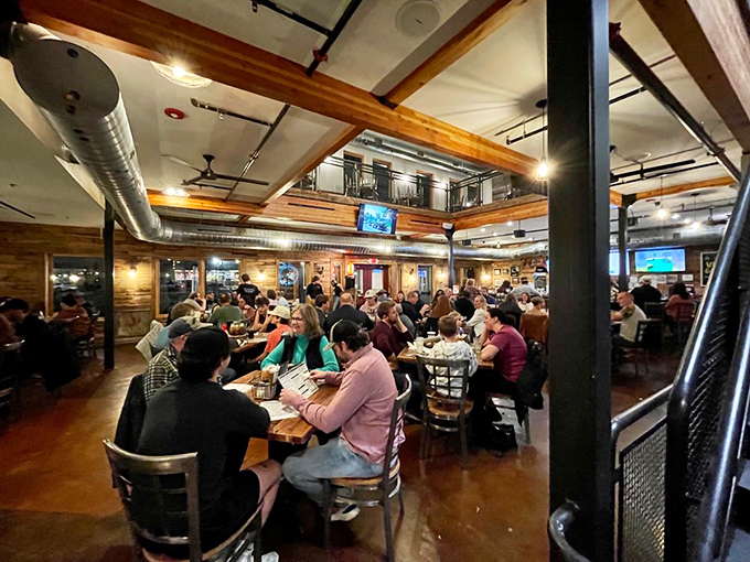 Happy diners in their natural habitat. Notice how they lean in, as if gravity itself is pulled towards the BBQ goodness.