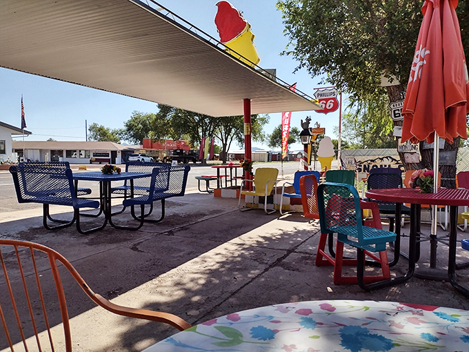 Pull up a chair of many colors! This outdoor seating area is like a box of crayons exploded in the best way possible. Perfect for people-watching and burger-munching.