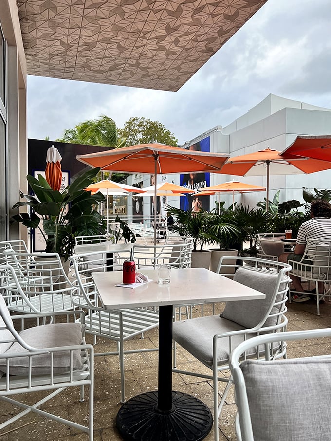 Al fresco dining that's pure Florida fantasy. With lush plants and cheery umbrellas, it's like a mini-vacation with every bite.