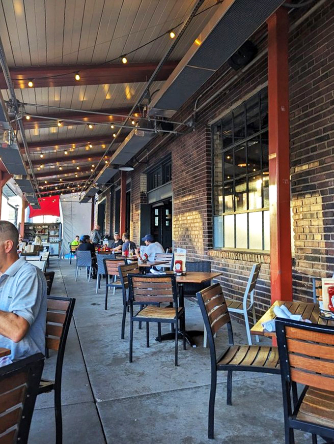 Alfresco feast-o! This patio is serving up summer vibes with a side of people-watching &ndash; bon app&eacute;tit!