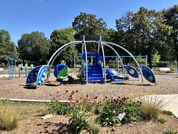 Playground paradise: Where jungle gyms meet flower gardens &ndash; it's like Willy Wonka designed a playground, minus the chocolate rivers.