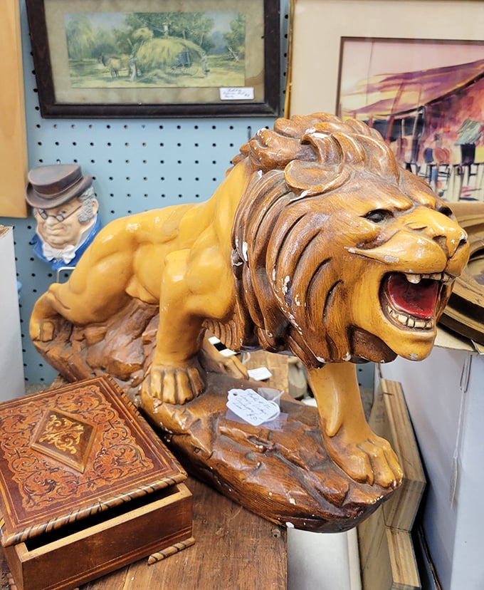 Who let the lion out of the book? This golden guardian looks ready to pounce on unsuspecting bargain hunters. Antique shopping: extreme edition!