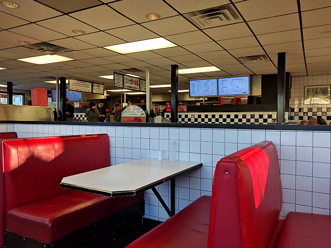 Red booths and checkered floors: Al's decor is playing chess while other diners are still on checkers.