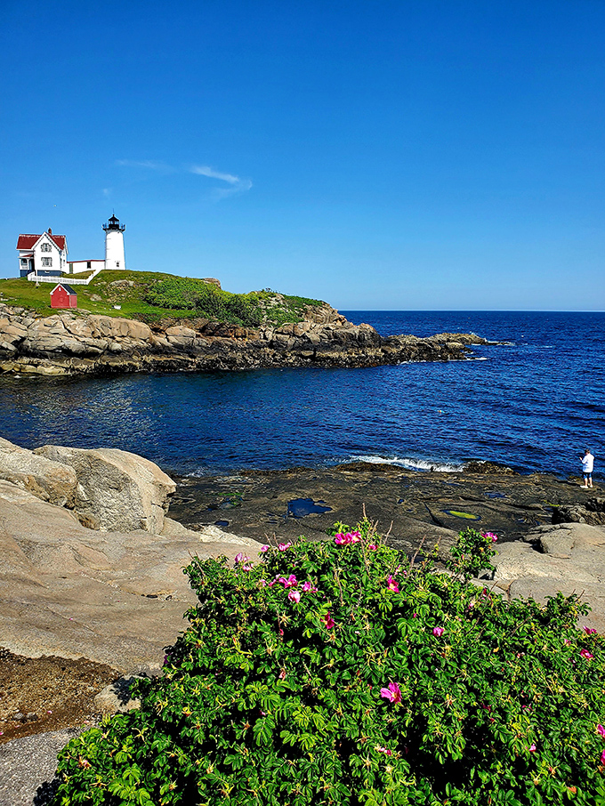 Nubble Light, where land meets sea in a spectacular dance. It's like watching nature's own rom-com unfold before your eyes.