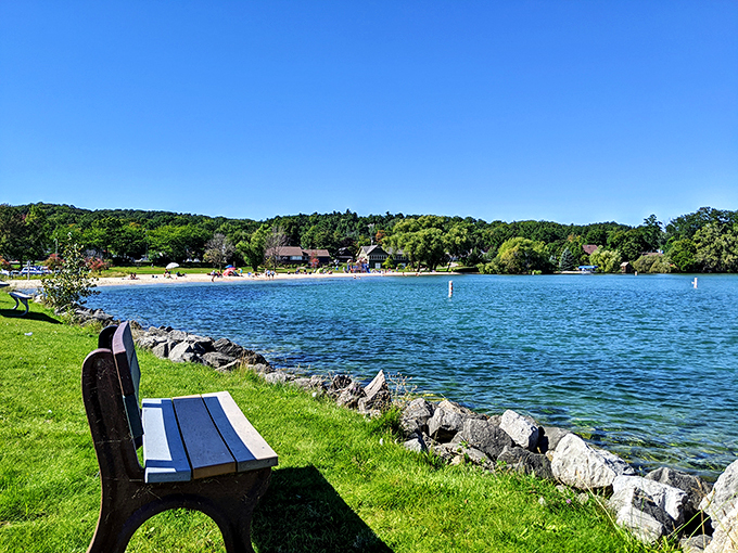 Suttons Bay's public beach: Where the water's as clear as your conscience after eating a whole pie from the local bakery.